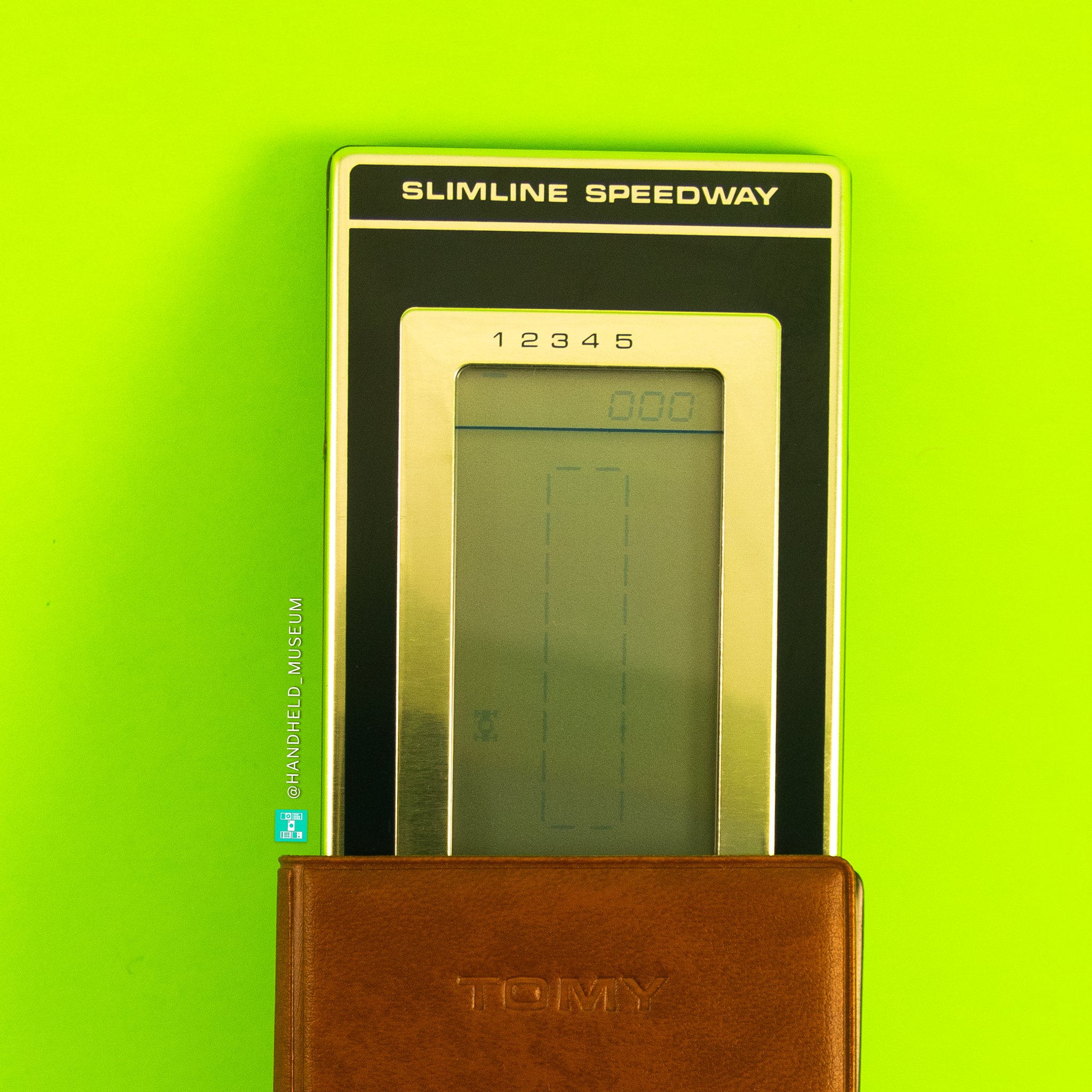 Tomy Corp. Tomytronic Slimline Speedway - Gaming - Handheld Computer Museum